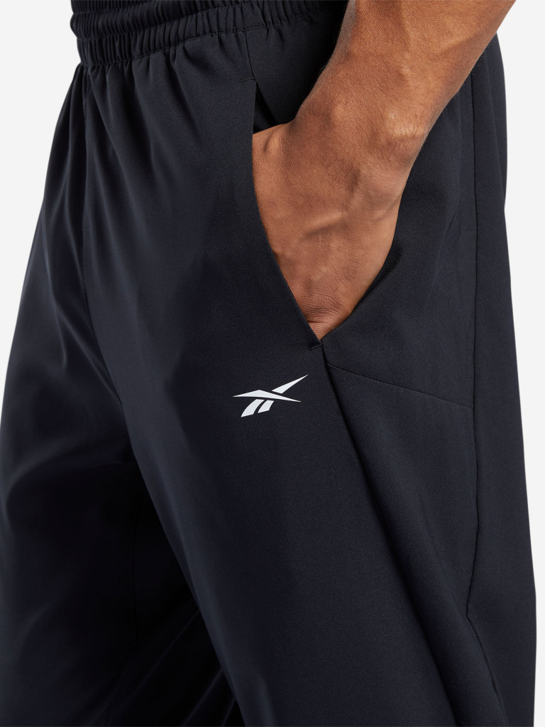 Брюки мужские Reebok Train арт. 100038337 черный цвет — купить за 6699 ...